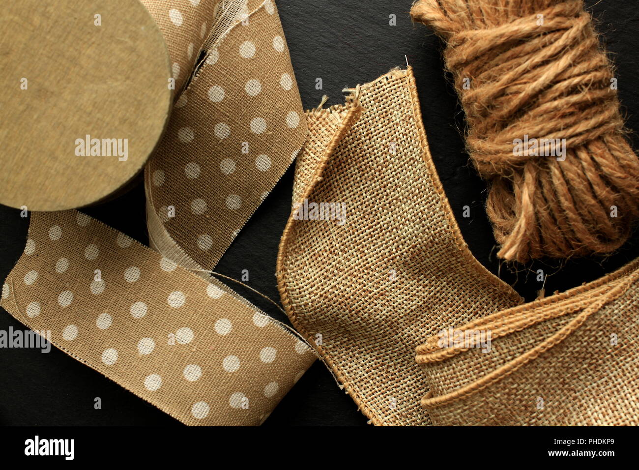 Cotton Tape, Jute Tape and Cord on black background Stock Photo - Alamy