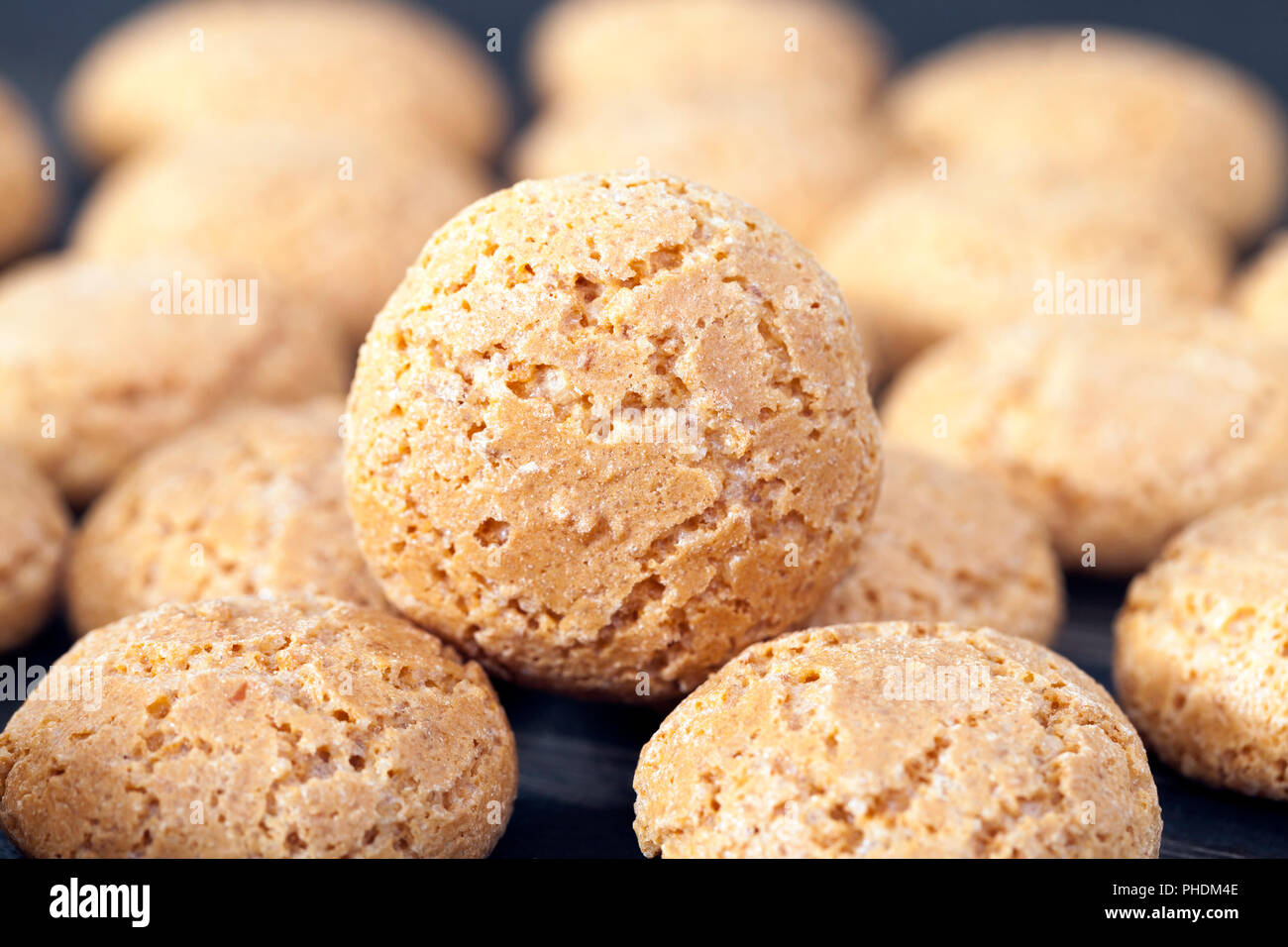 round small biscuits lying together and having holes, closeup of food ...