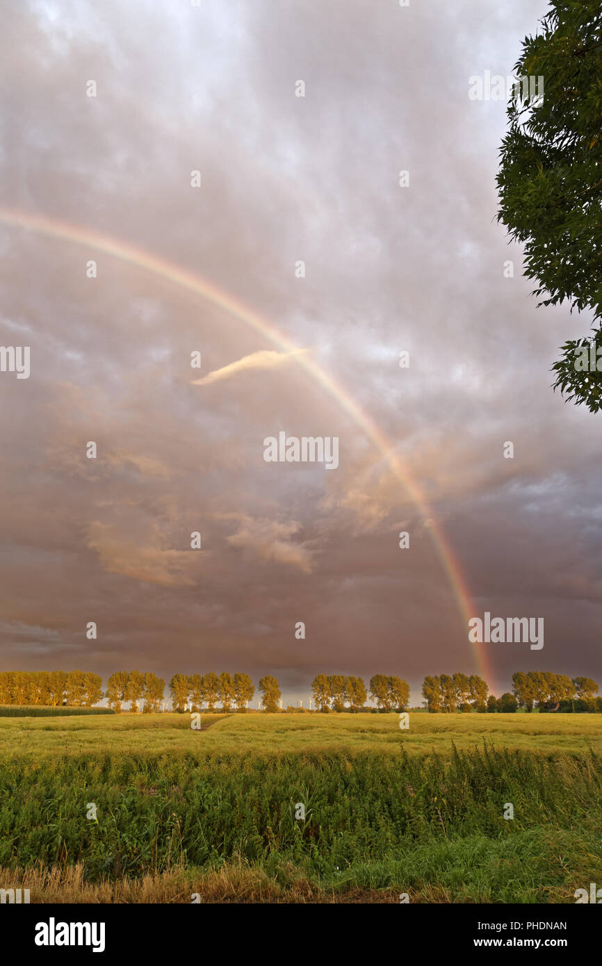 Rainbow in sky hi-res stock photography and images - Alamy