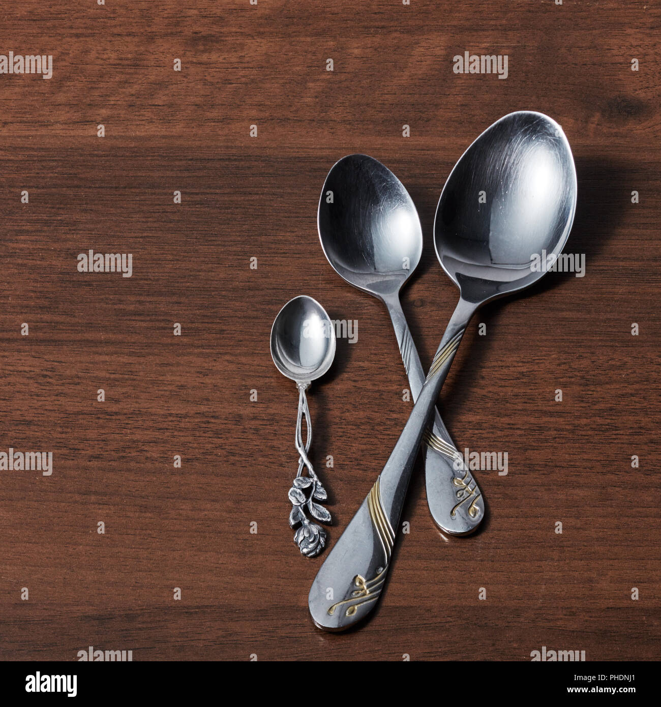 Three empty wooden spoons hi-res stock photography and images - Alamy