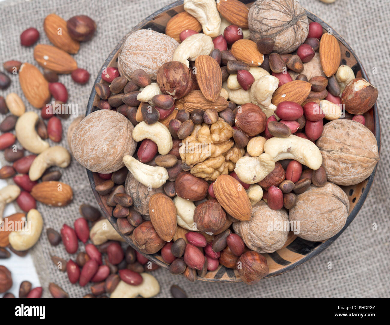 Assorted nuts in bowl Stock Photo - Alamy