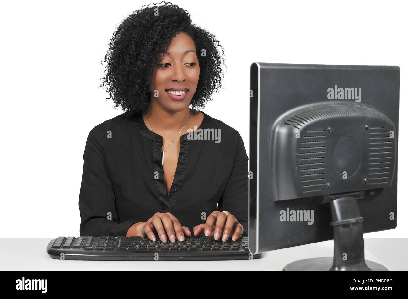 Woman on desktop computer Stock Photo - Alamy