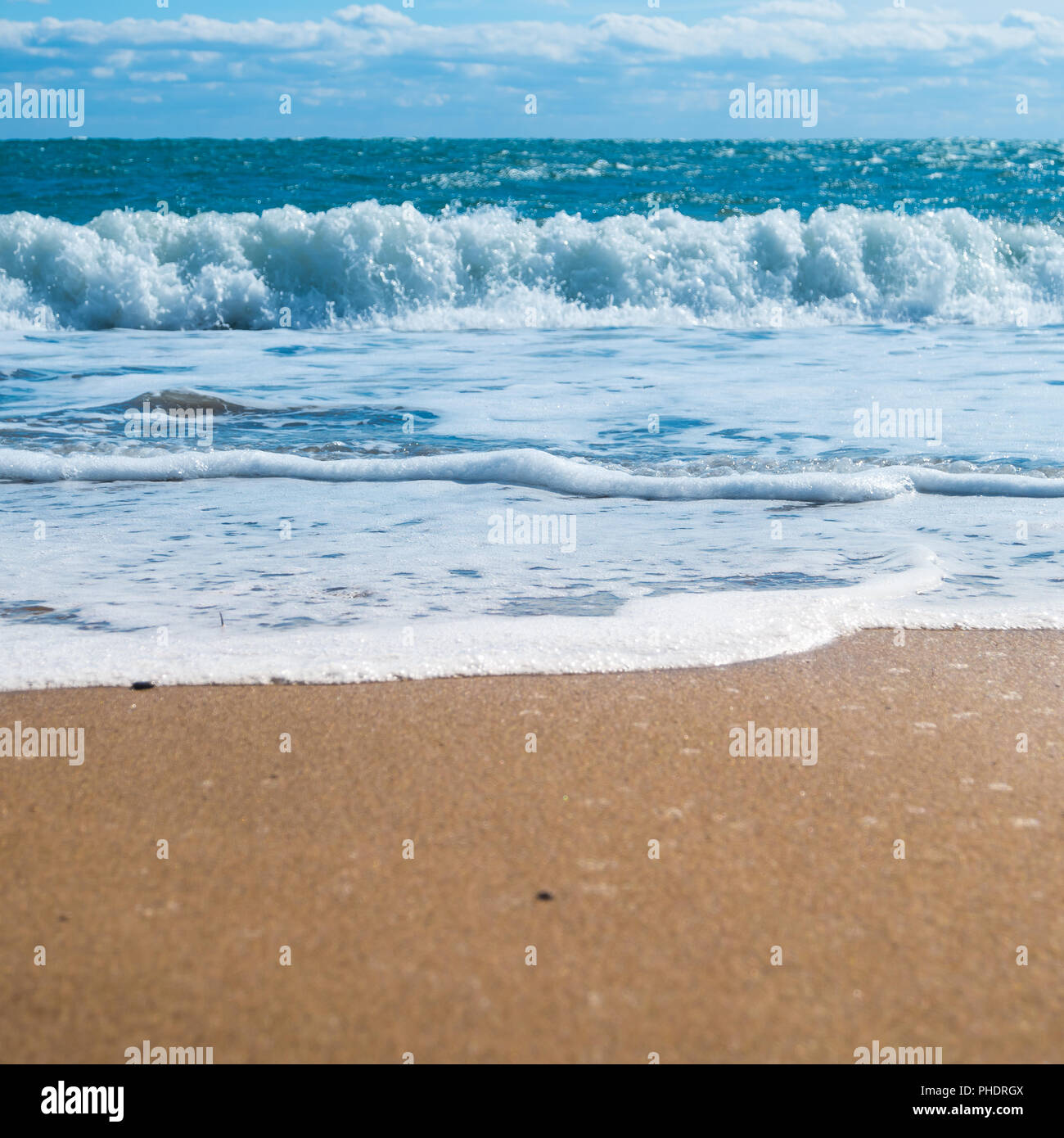 Blue beach golden sand hi-res stock photography and images - Alamy