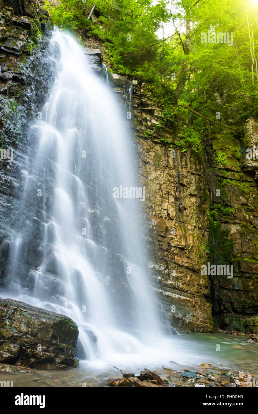 Beautiful waterfall in the forest Stock Photo - Alamy