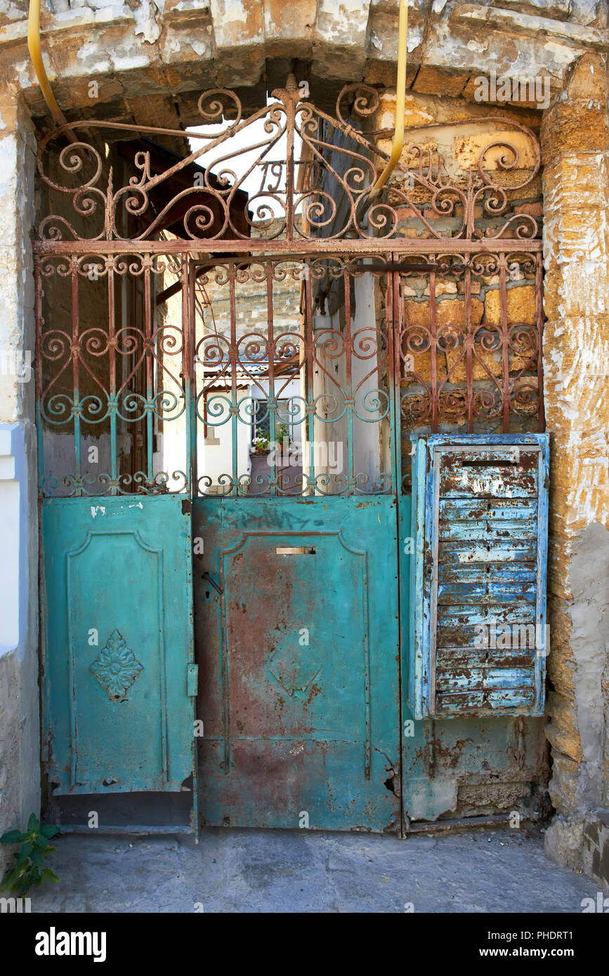 Old rusty iron gate Stock Photo - Alamy