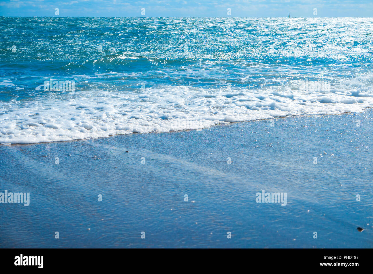 Blue beach golden sand hi-res stock photography and images - Alamy