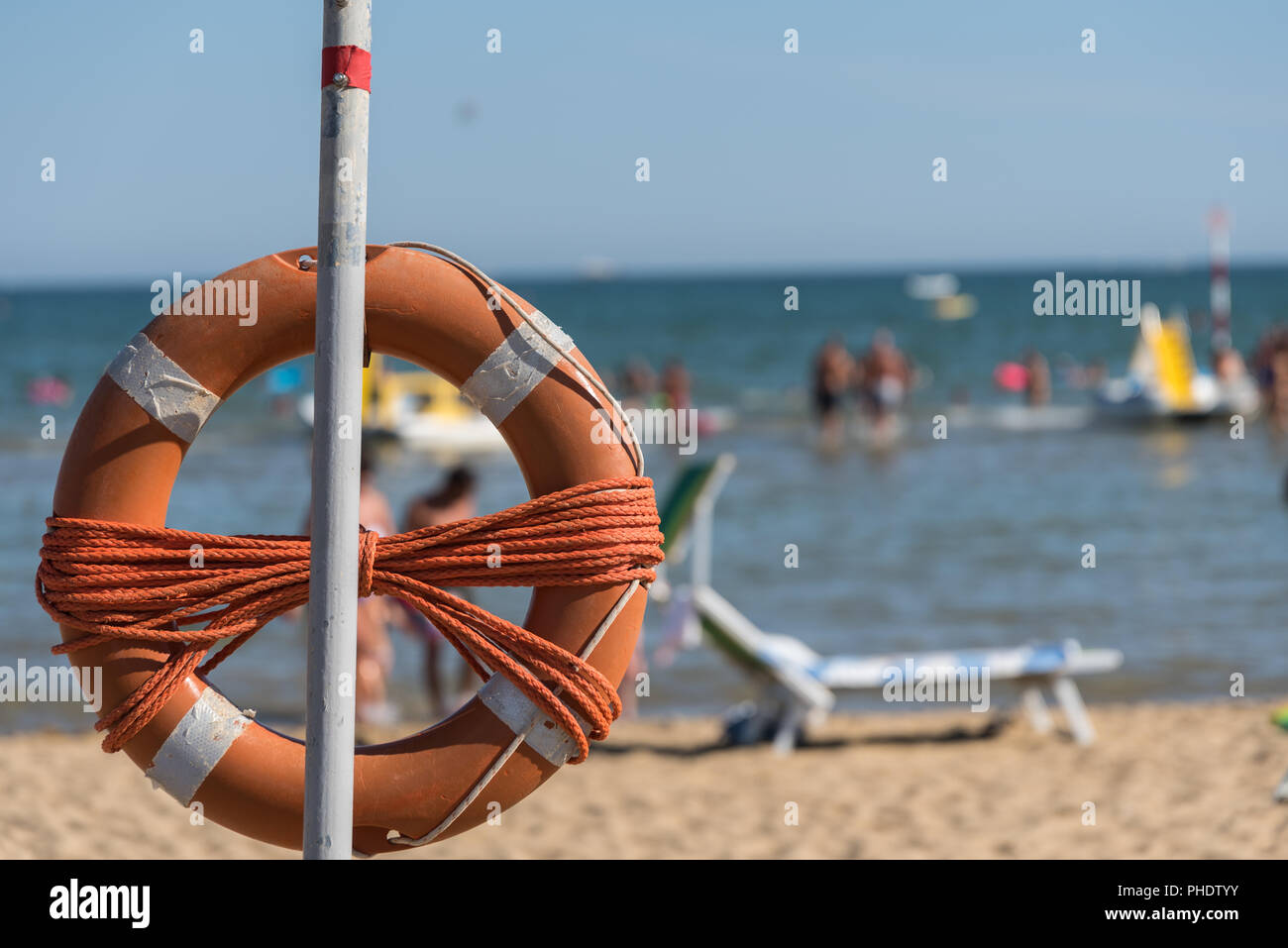 Lifebuoy on the beach Stock Photo - Alamy