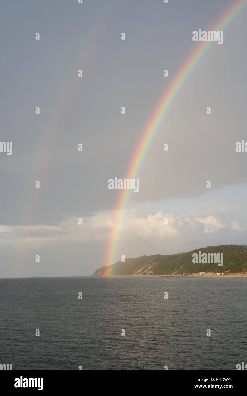 Rainbow on sea hi-res stock photography and images - Alamy