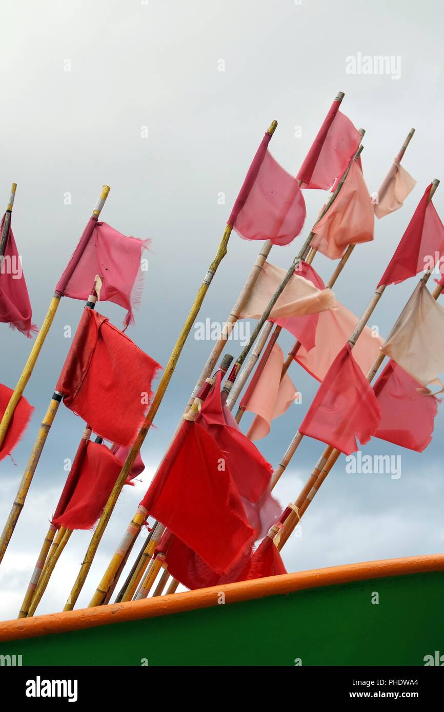 Red flags on fishing buoys Stock Photo - Alamy