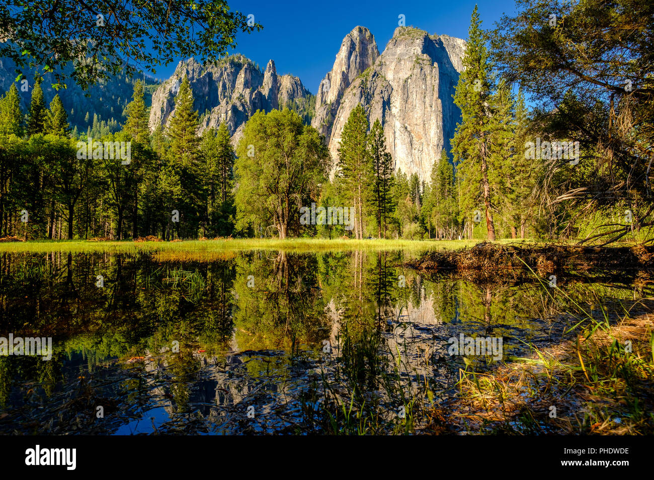 Cathedral Rocks reflecting in Merced River at Yosemite Stock Photo - Alamy
