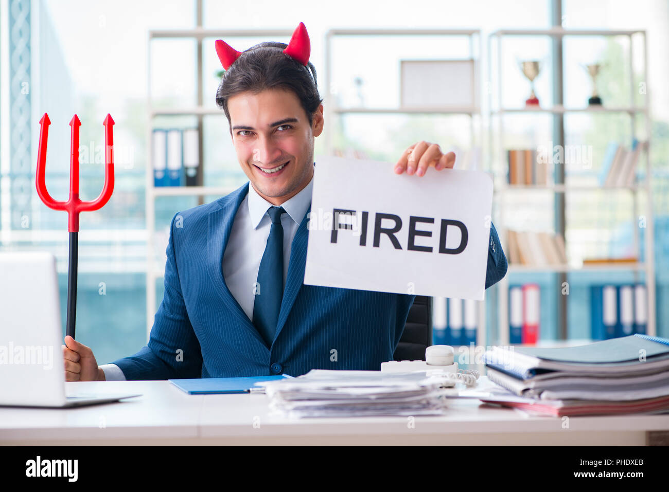Devil angry businessman in the office Stock Photo - Alamy