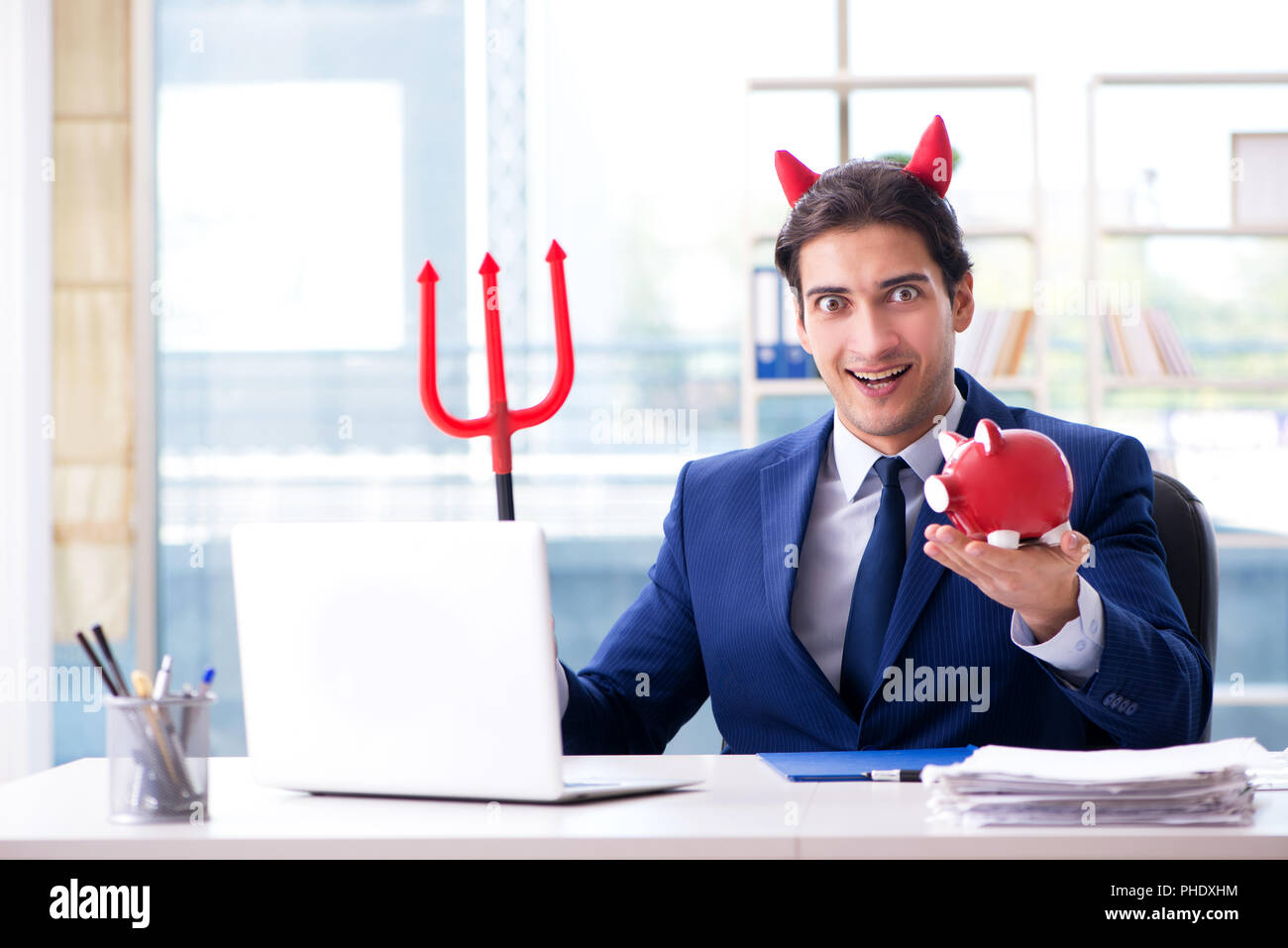 Devil angry businessman in the office Stock Photo - Alamy