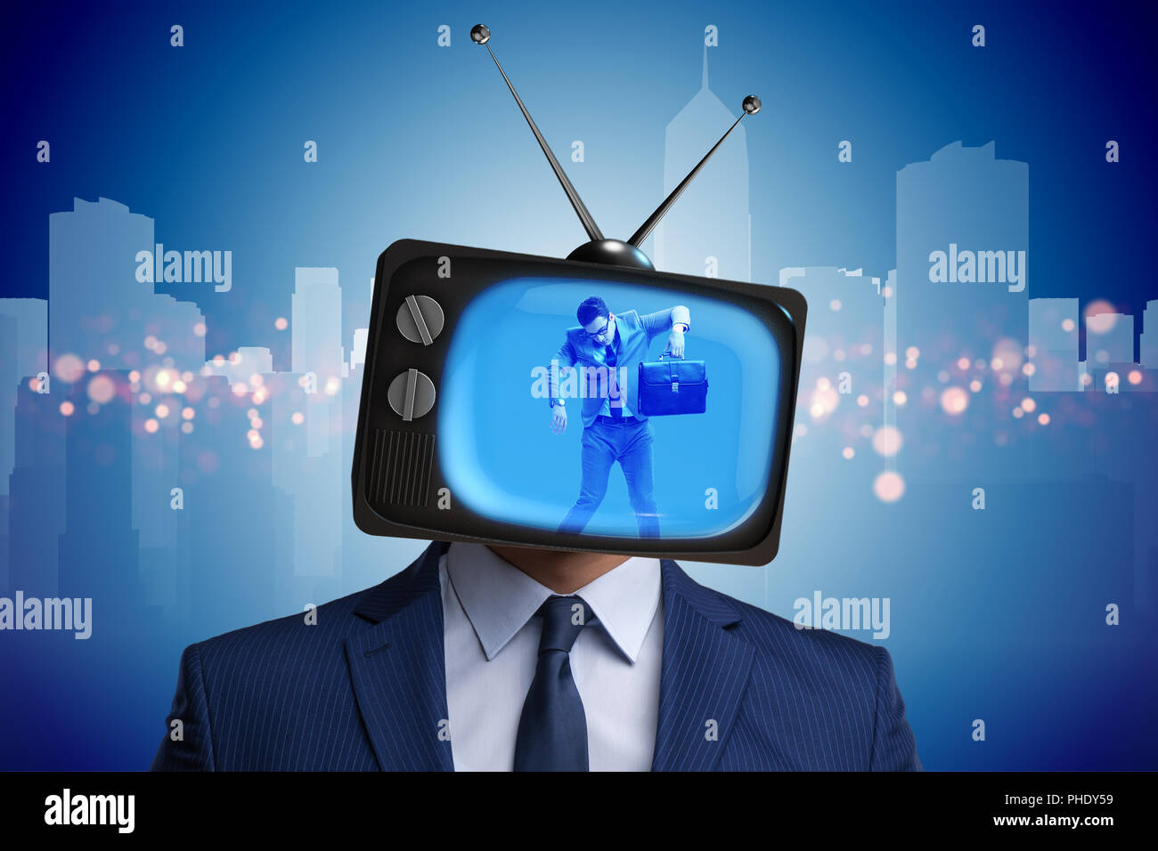 Man with television head in tv addiction concept Stock Photo - Alamy
