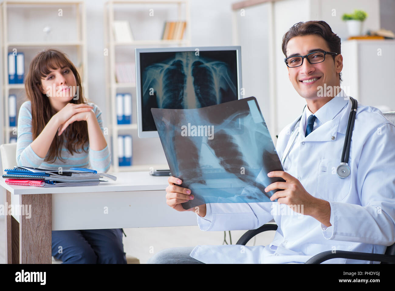 Young woman visiting radiologist ray hi-res stock photography and ...