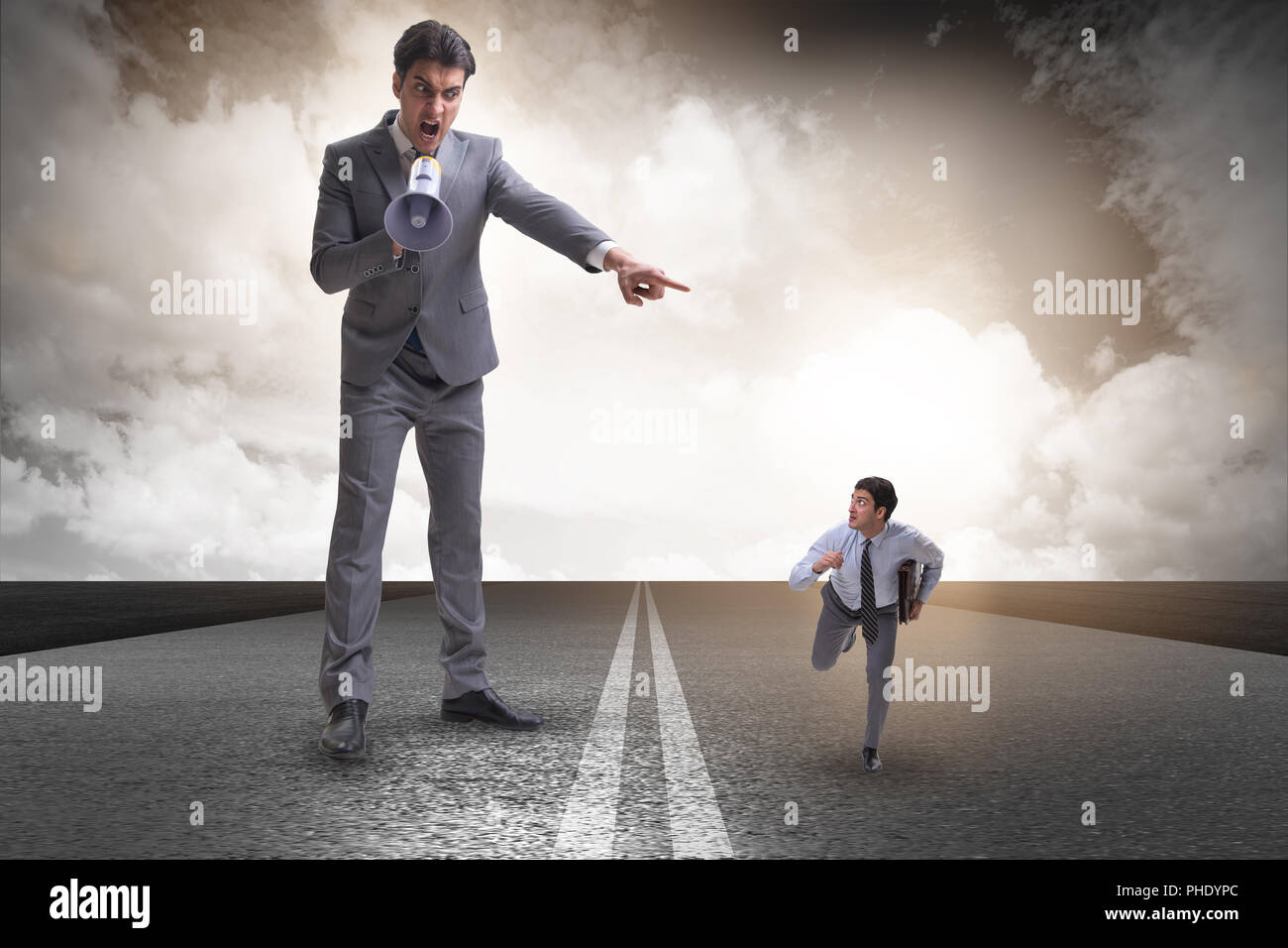 Bad angry boss shouting at employee with loudspeaker Stock Photo - Alamy