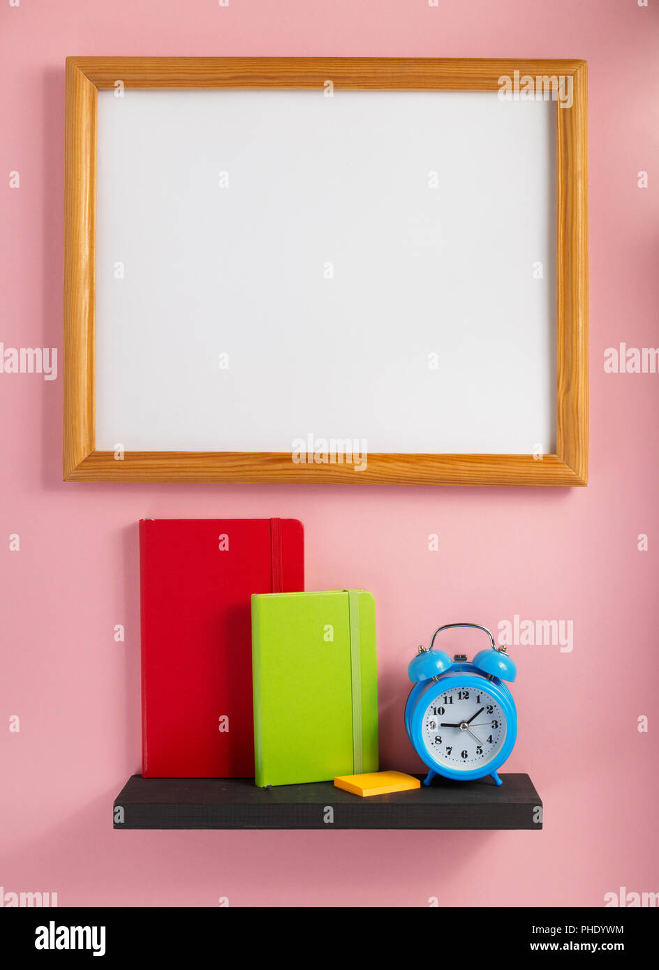 notepad and book on shelf at wall background surface Stock Photo - Alamy