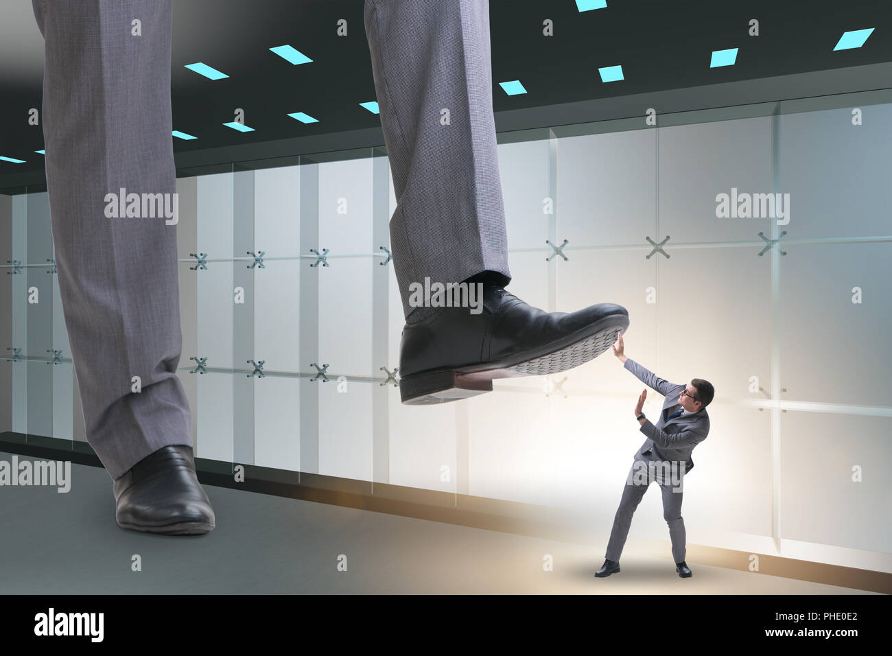 Bad angry boss stamping on employee in business concept Stock Photo - Alamy