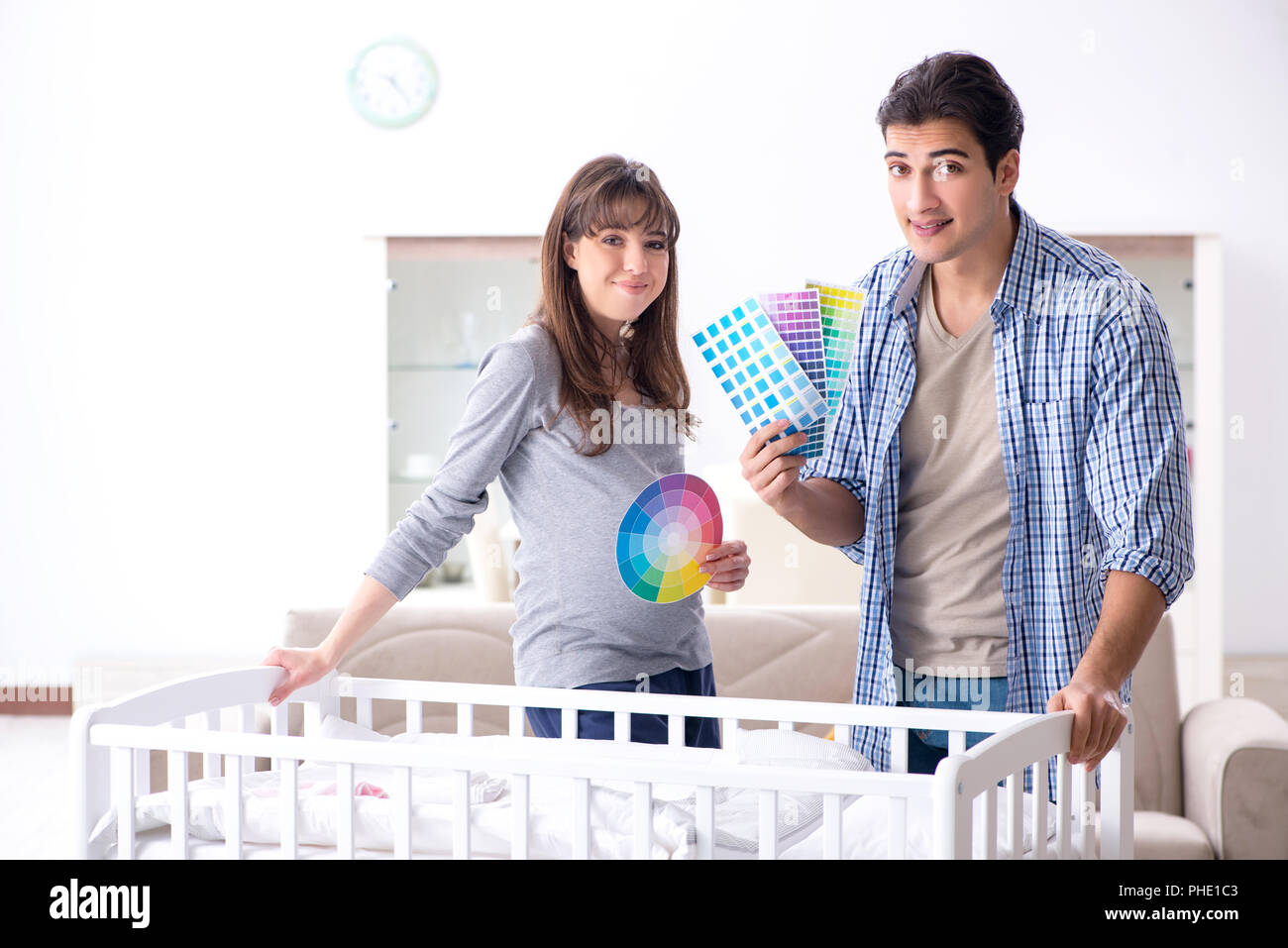 Young parents expecting their first baby Stock Photo - Alamy