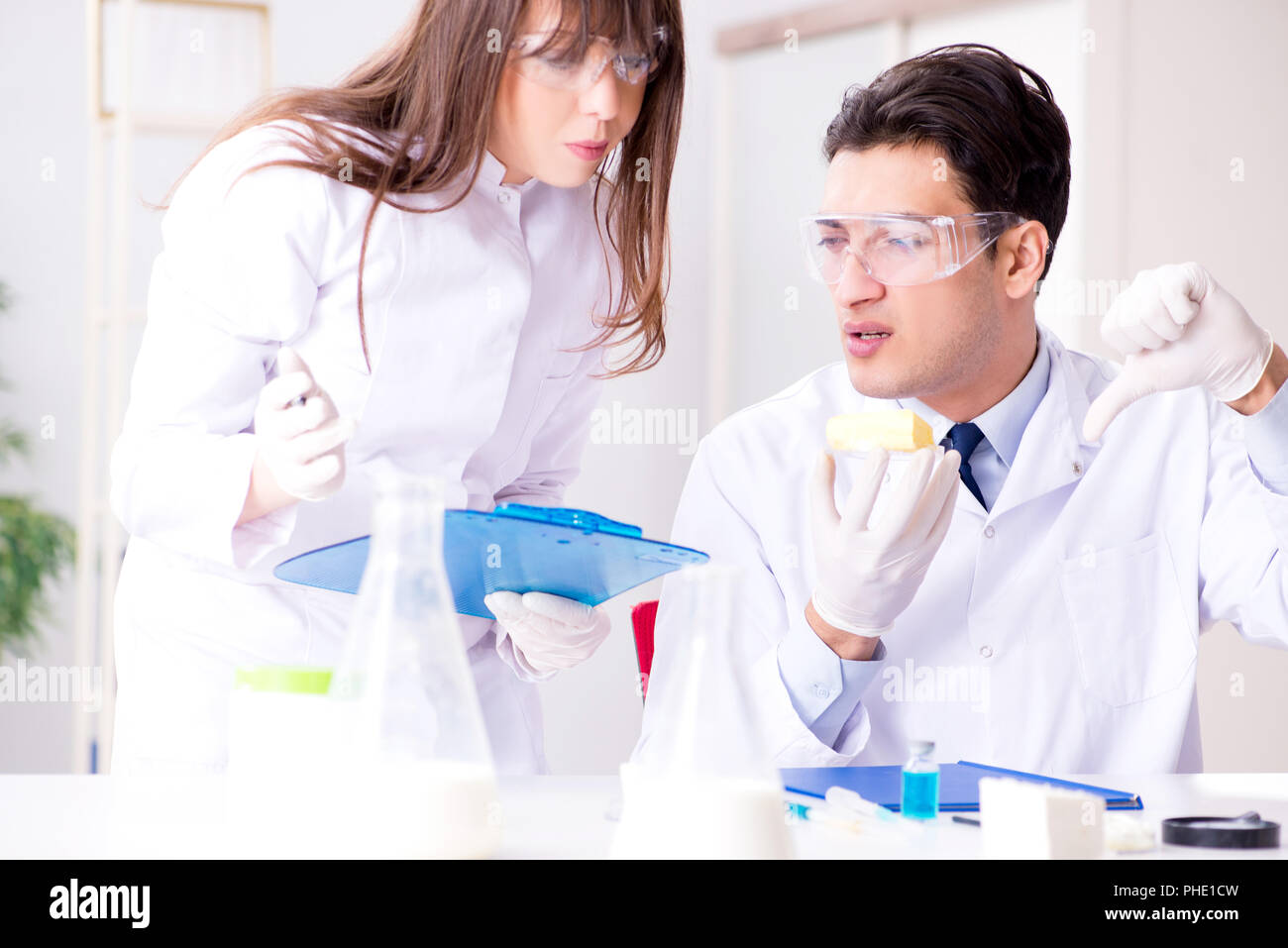Two lab doctor testing food products Stock Photo - Alamy