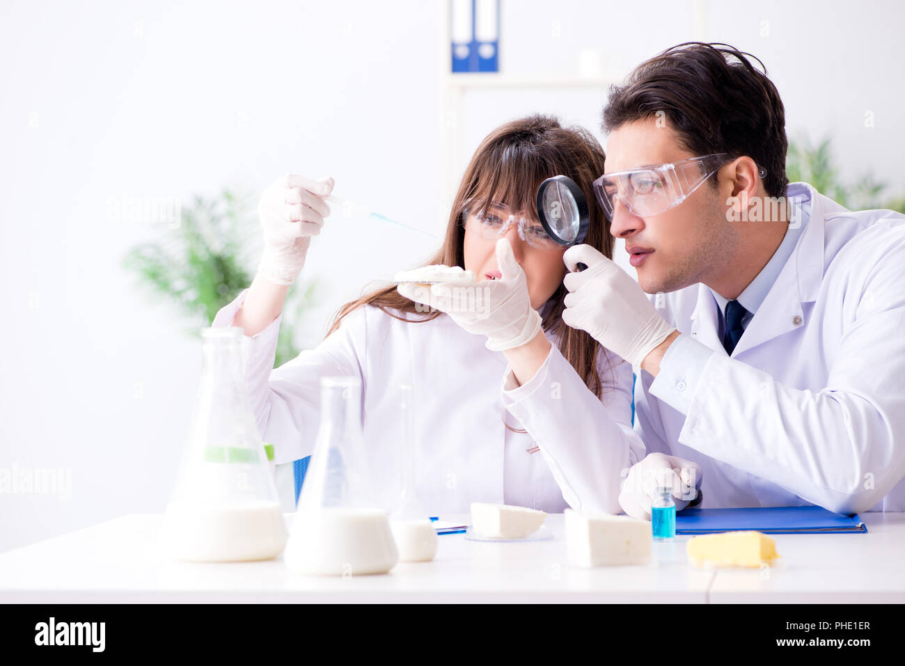 Two lab doctor testing food products Stock Photo - Alamy