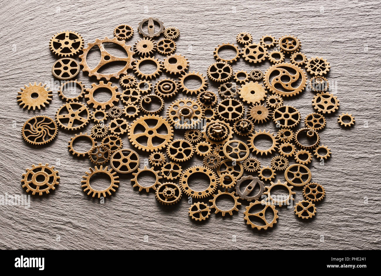 Various metal cogwheels and gear wheels Stock Photo - Alamy