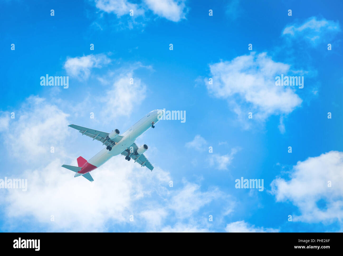 Big commercial airplane is flying in the air hi-res stock photography ...