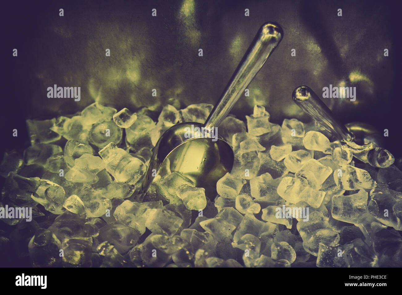 Metallic ladle with ice cubes Stock Photo - Alamy