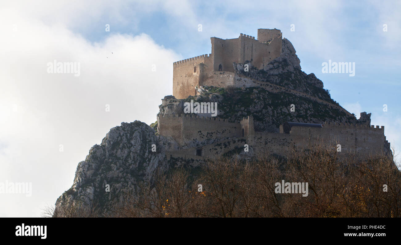 Panorama of an ancient medieval castle on top of a mountain Stock Photo ...