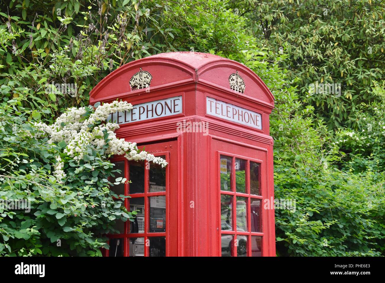 Iconic red London telephone booths operated by Royal Mail, London ...