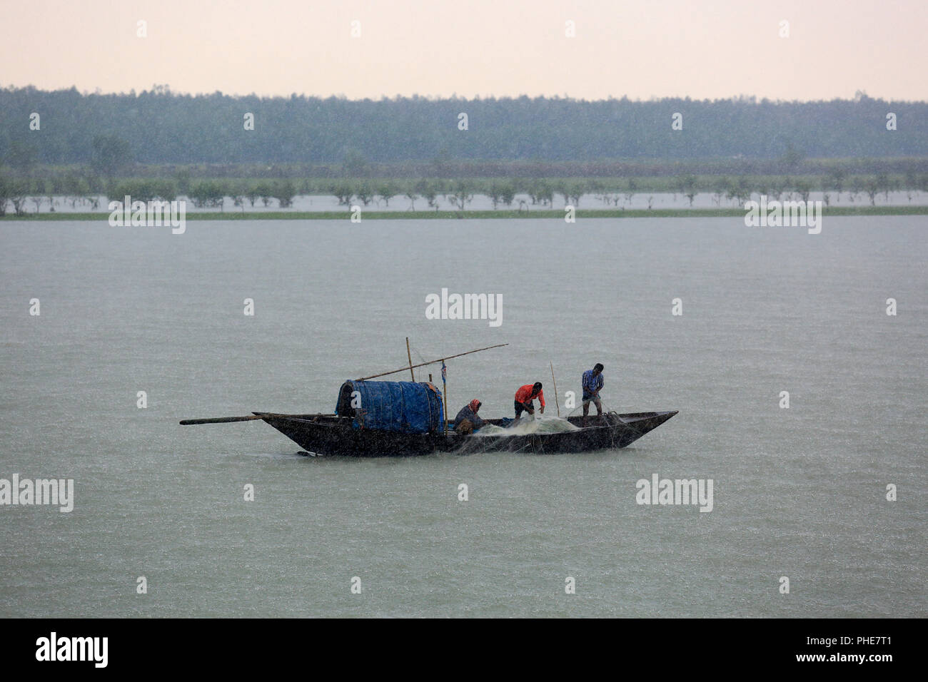 Fishermen fishing in the Tetulia River, Patuakhali, Bangladesh Stock ...