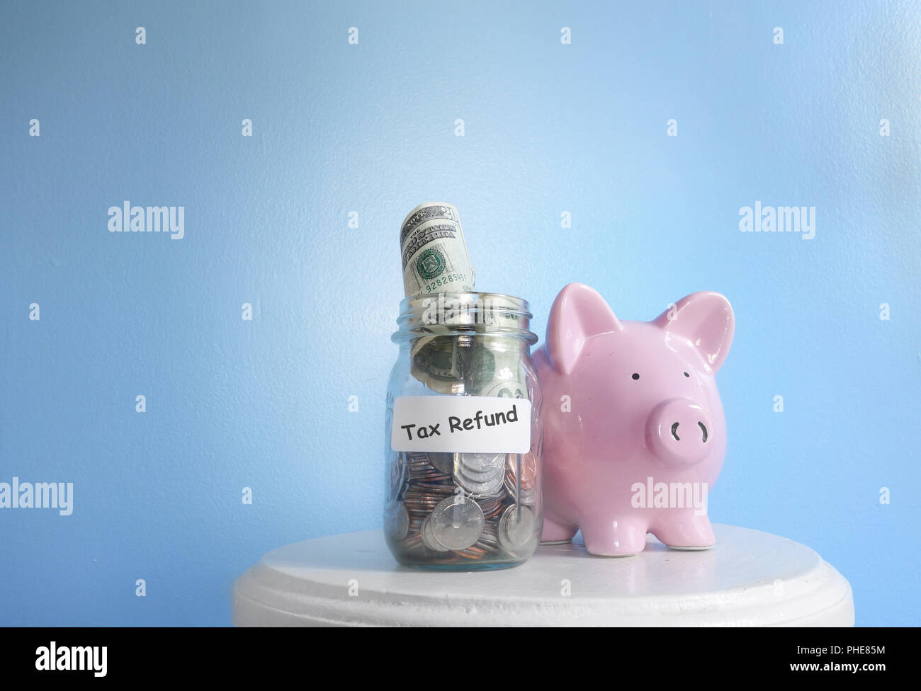 Tax refund money Stock Photo - Alamy