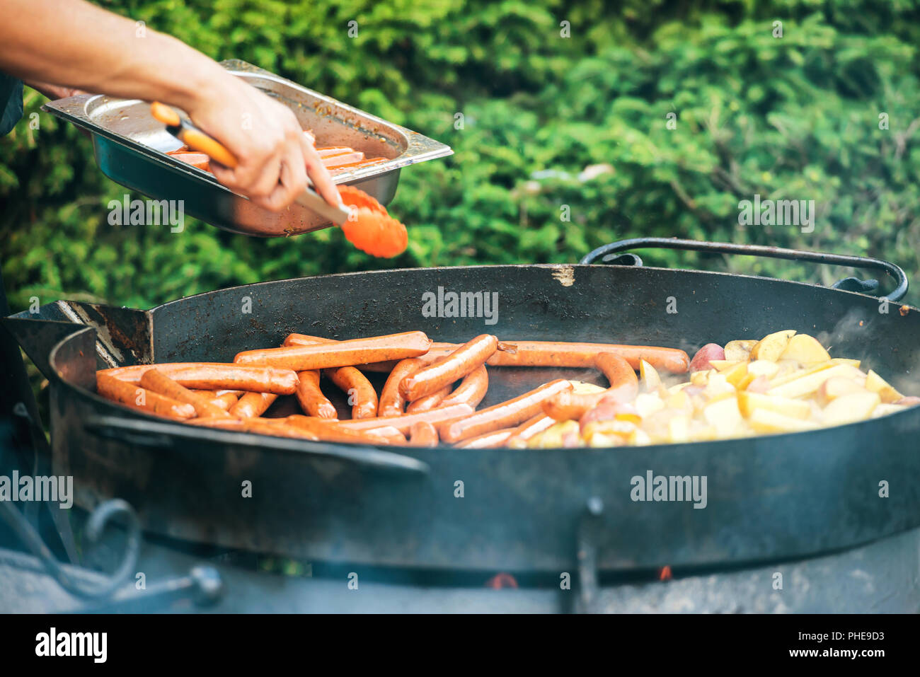 Grilled sausages cooking on hi-res stock photography and images - Alamy
