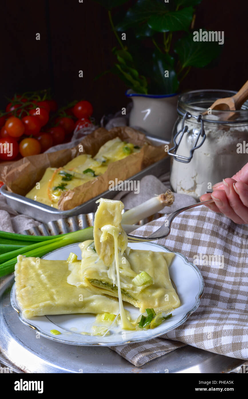 Swabian ravioli gratinated with cheese Stock Photo - Alamy