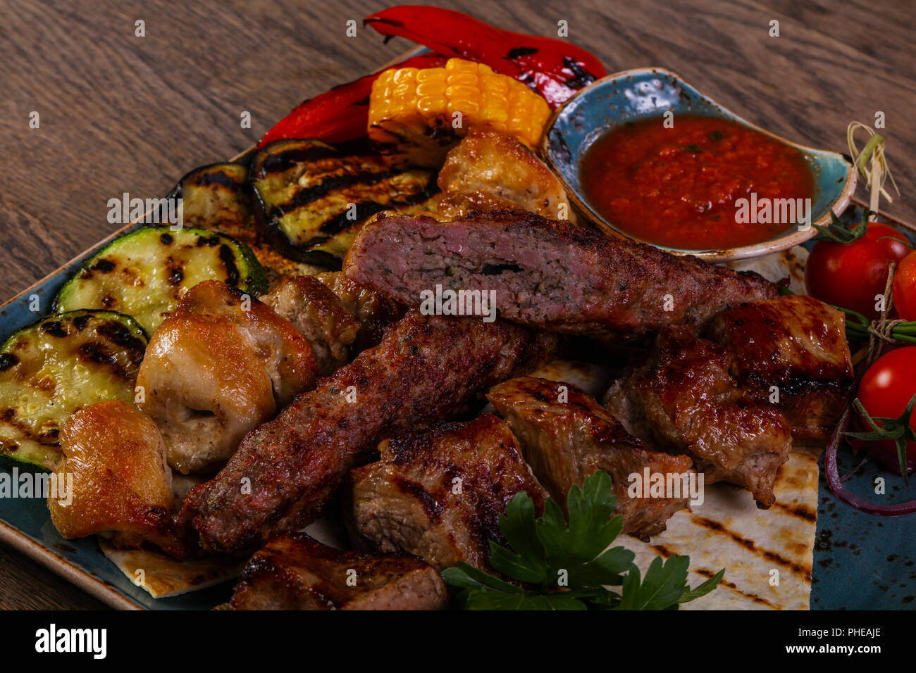 Grilled plate mix assortment meat Stock Photo - Alamy