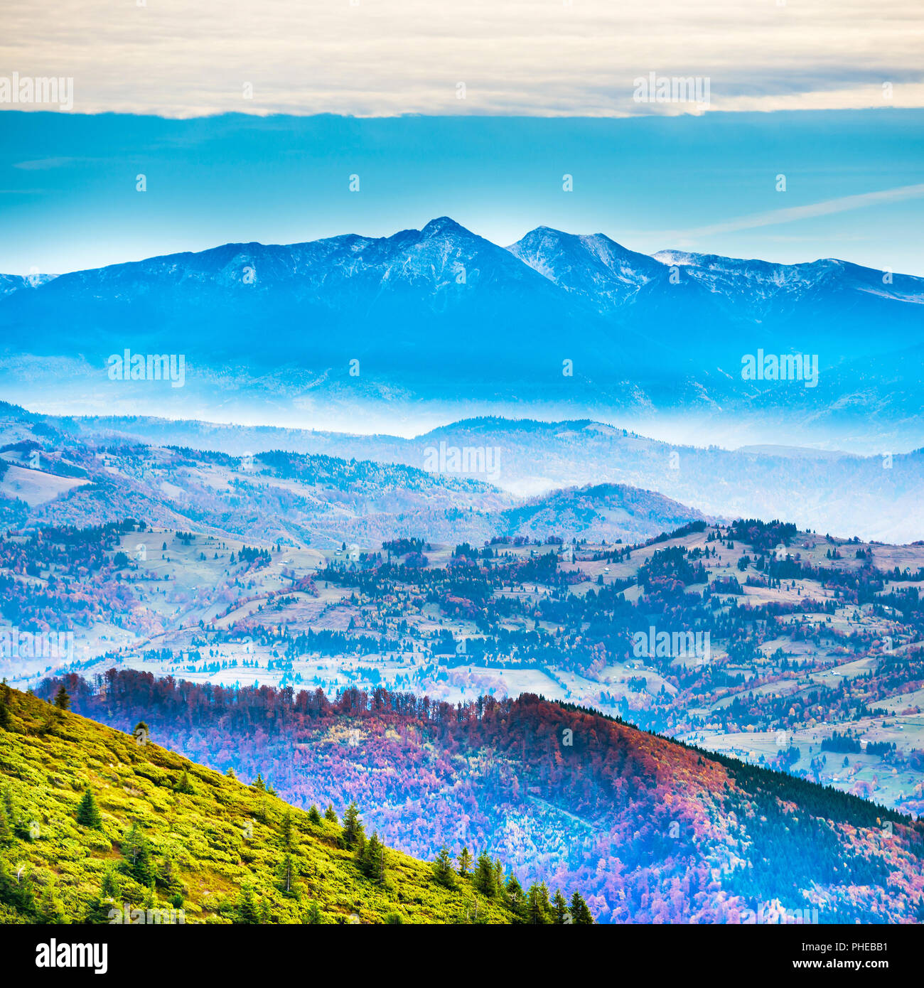 Beautiful blue mountains and green hills Stock Photo - Alamy