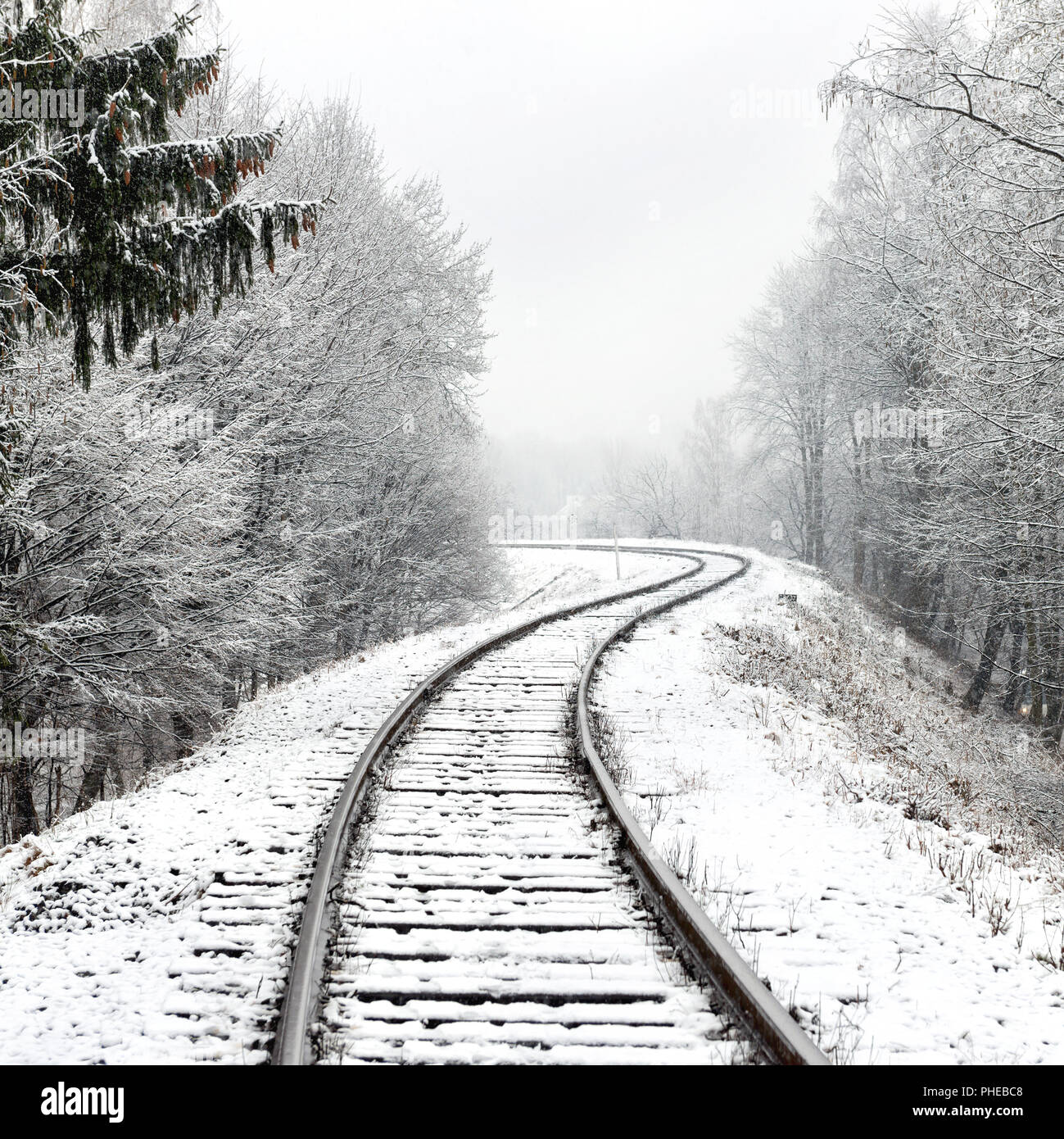 Railway in snow Stock Photo - Alamy