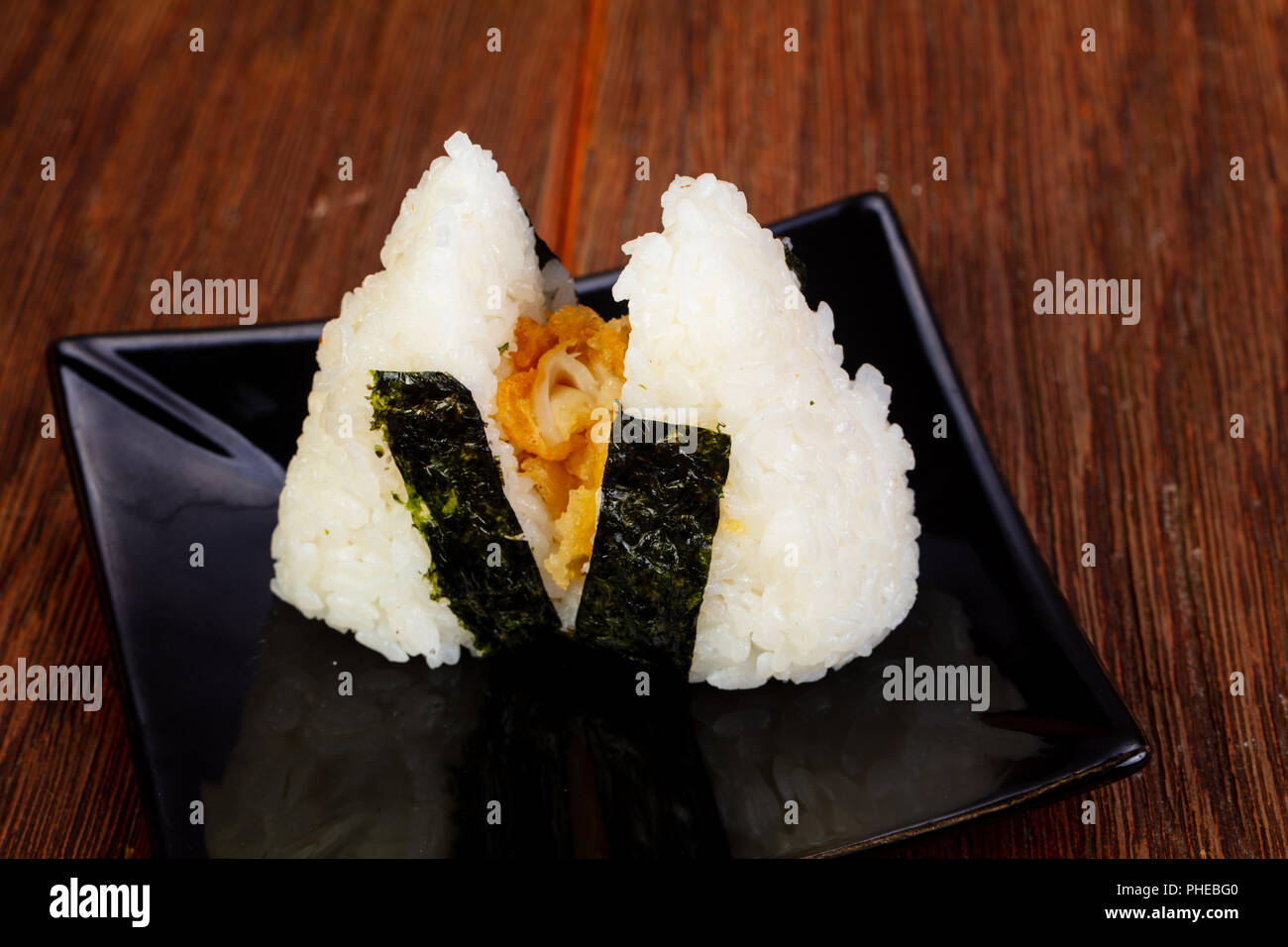 Japanese traditional Onigiri with squid Stock Photo - Alamy