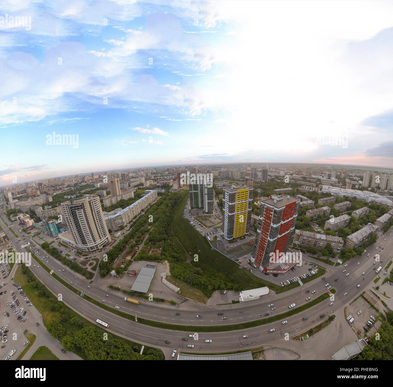 Aerial view of square in the city with roundabout traffic, streets and ...