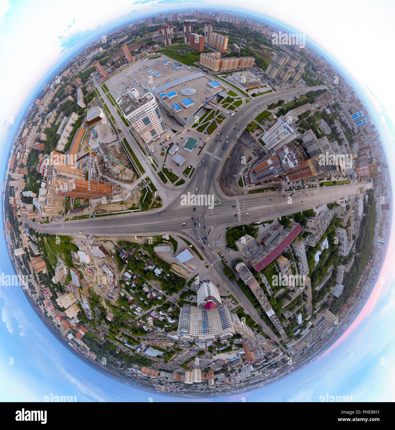 Aerial view of square in the city with roundabout traffic, streets and ...