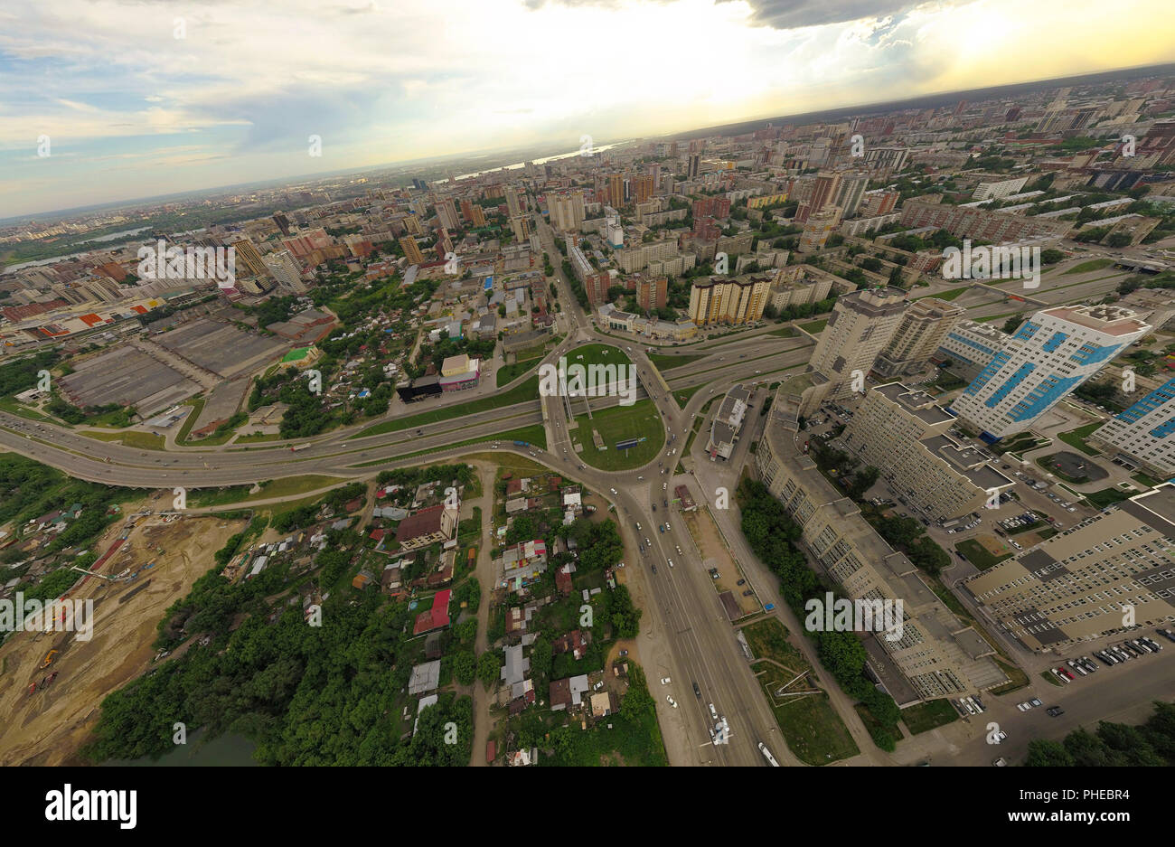 Aerial view of square in the city with roundabout traffic, streets and ...
