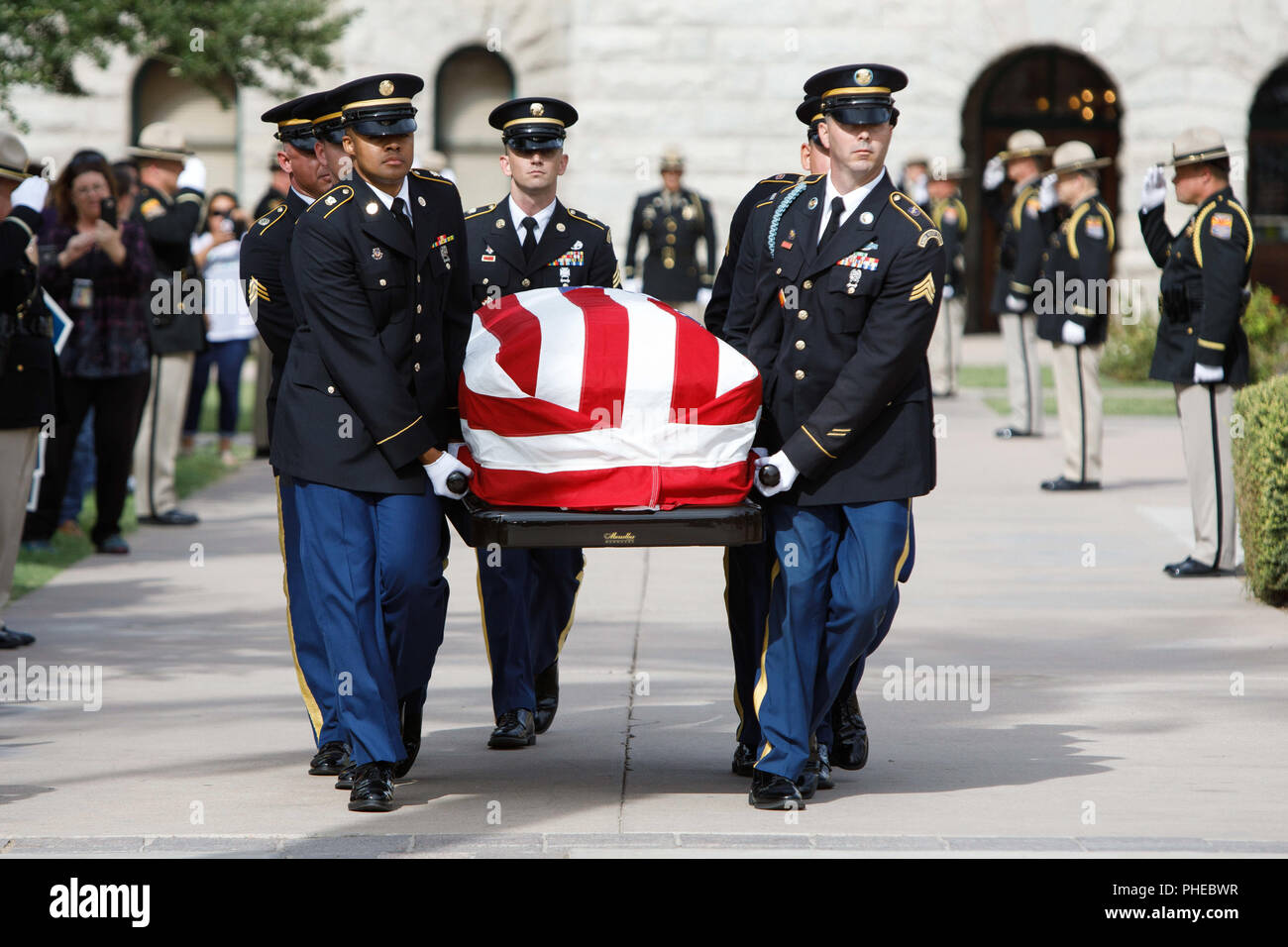 The Arizona Army National Guard’s Military Funeral Honors Team carries ...