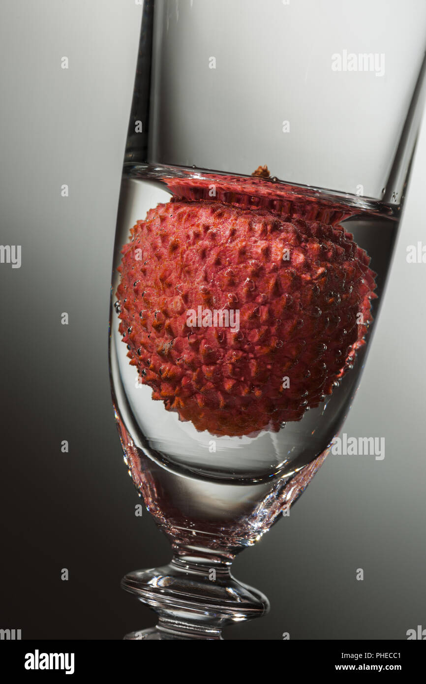 floating lychee in champagne glass Stock Photo - Alamy