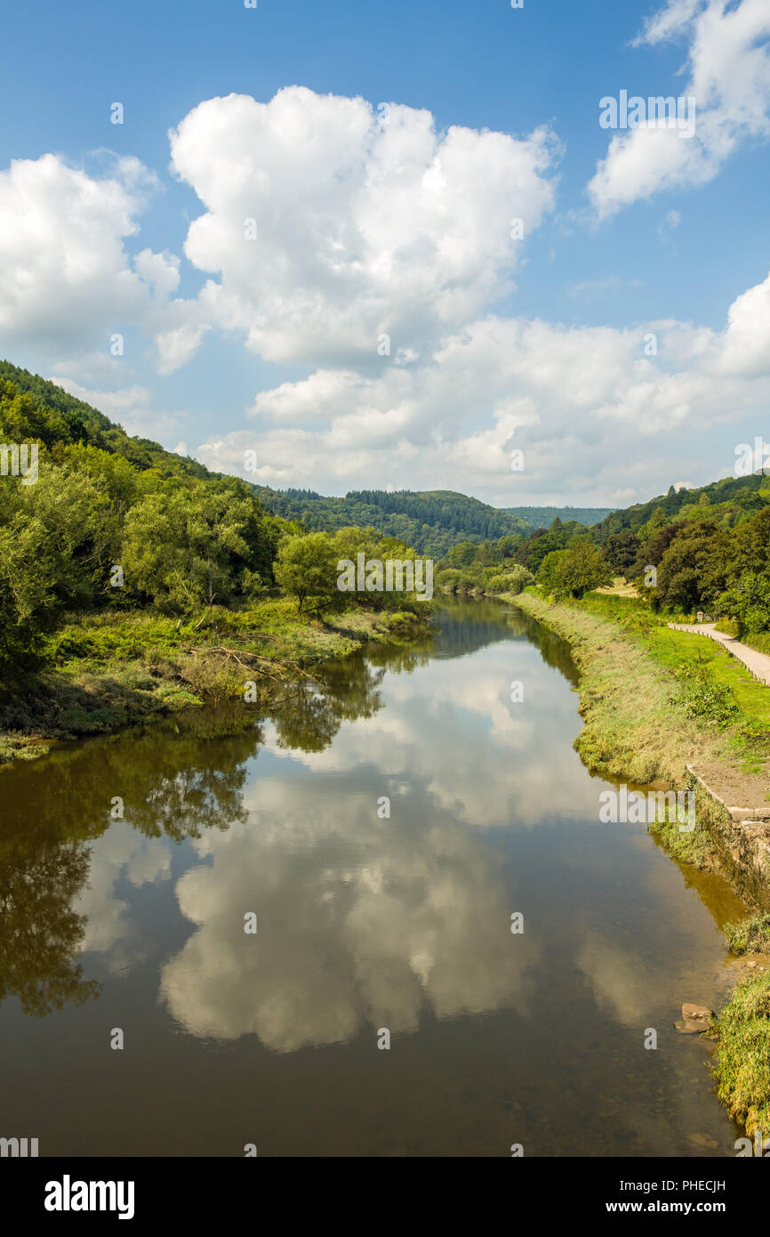 The River Wye and Cloud reflections seen from Brockweir Bridge in the ...