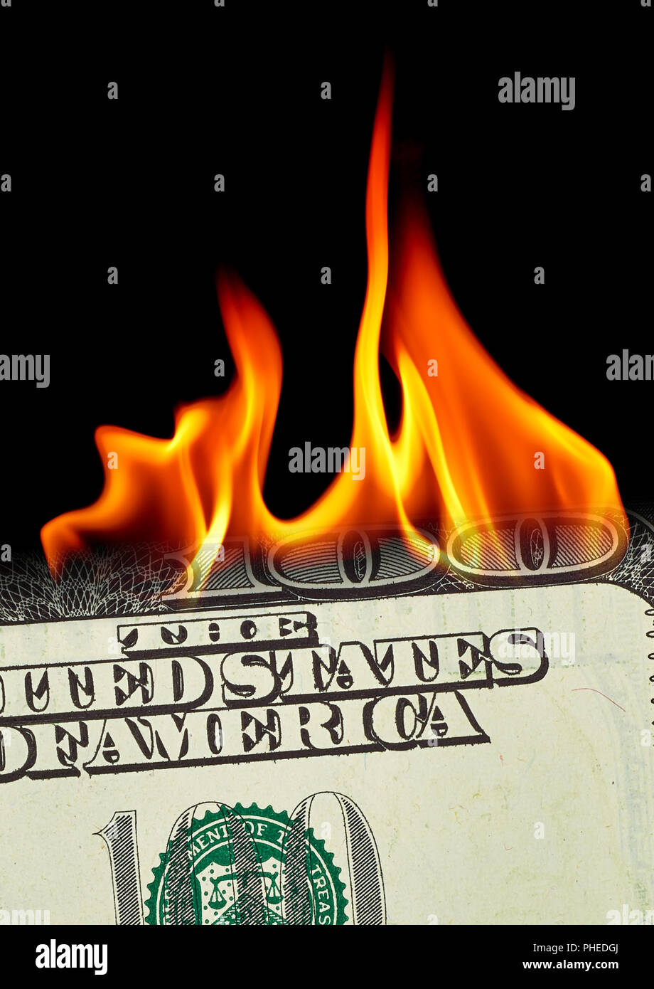 US Dollar bill burning in fire flame isolated on black background Stock ...