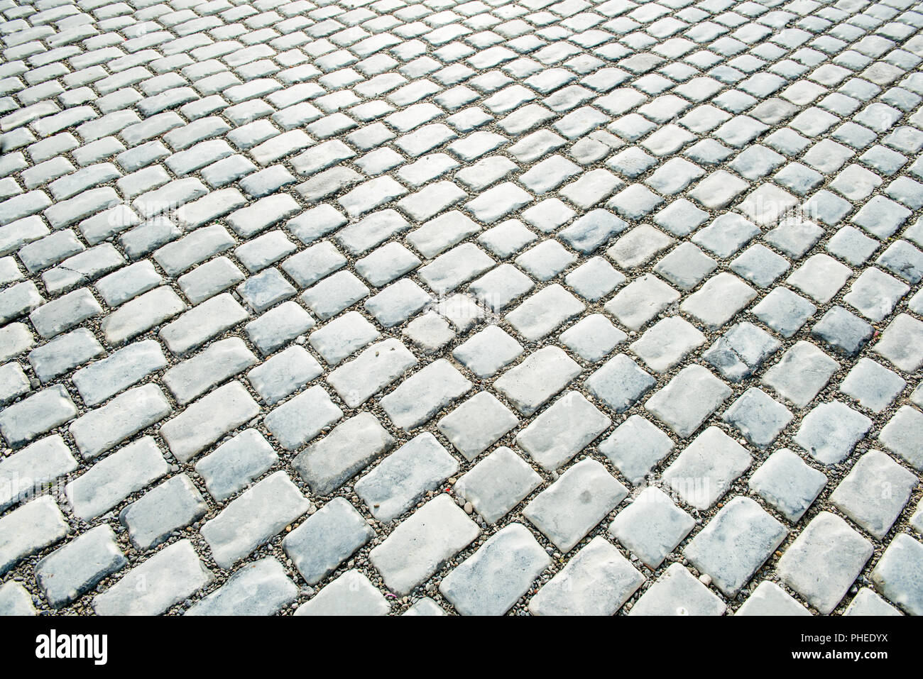 Road paved with cobble stones for your background Stock Photo - Alamy