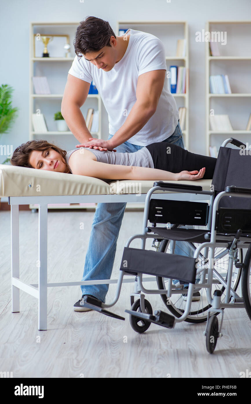 Patient undergoing rehabilitation recovery programme with doctor Stock ...