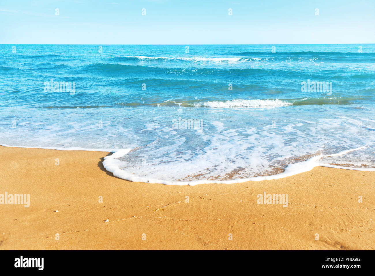 Tropical beach with sand and sea Stock Photo - Alamy