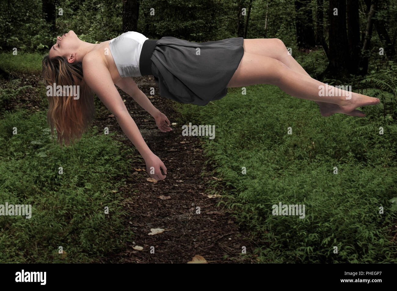 Beautiful Floating woman Stock Photo - Alamy