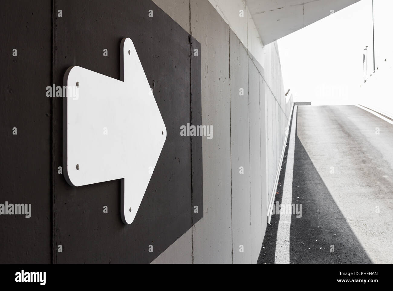 Arrow sign underground road arrow symbol hi-res stock photography and ...