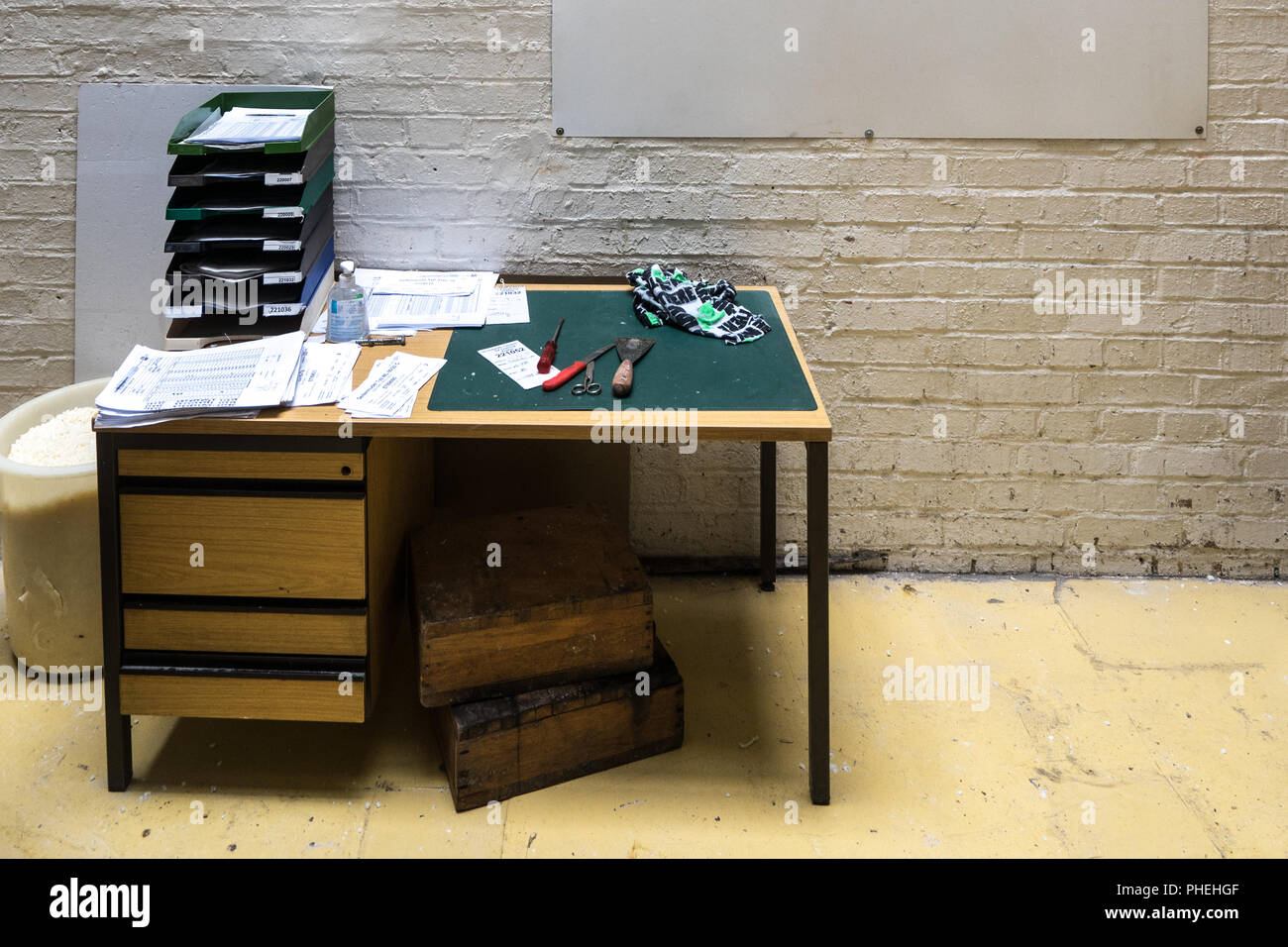 Abandoned desk in an old soap factory Stock Photo - Alamy